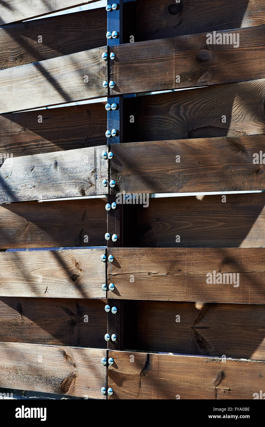 old wooden fence with iron rivets Stock Photo - Alamy