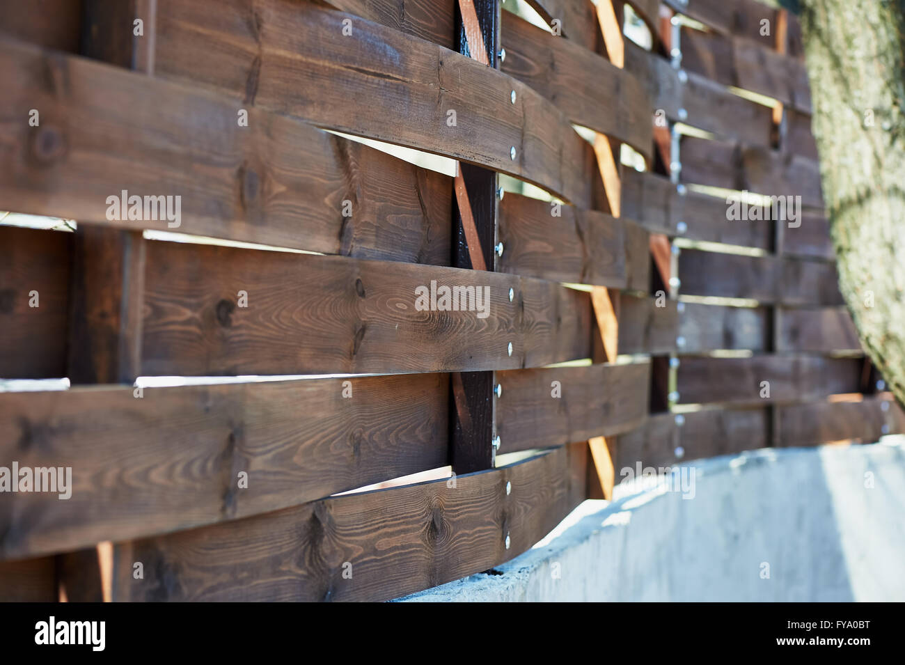 old wooden fence with iron rivets Stock Photo - Alamy