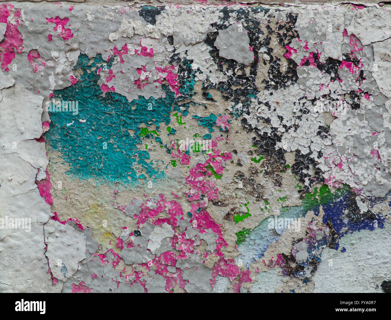 old, crumbling wall with multi-colored paint splashes Stock Photo - Alamy