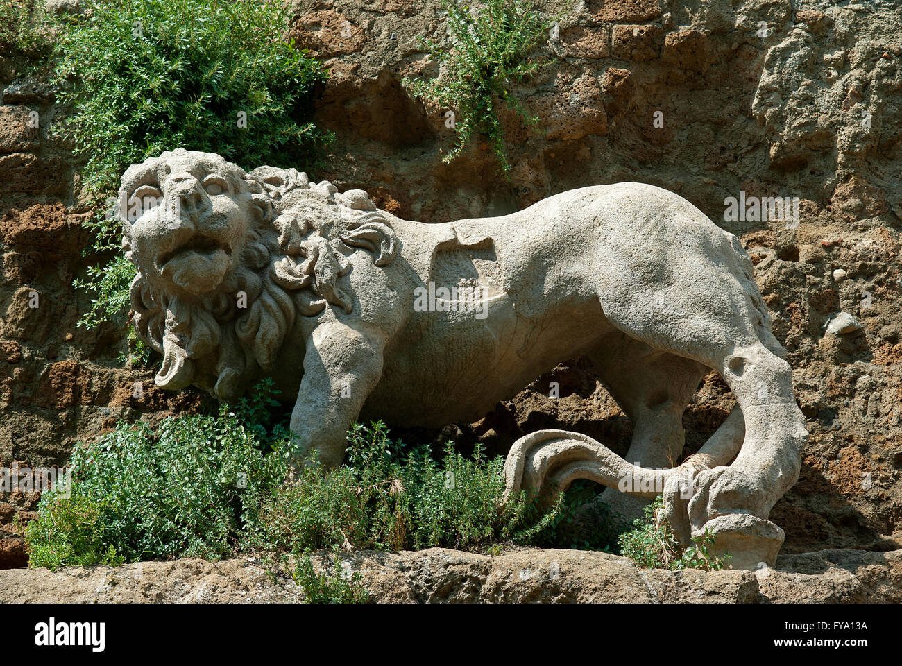 Lion statue by Gian Lorenzo Bernini, ruins of Orsini-Altieri Castle ...