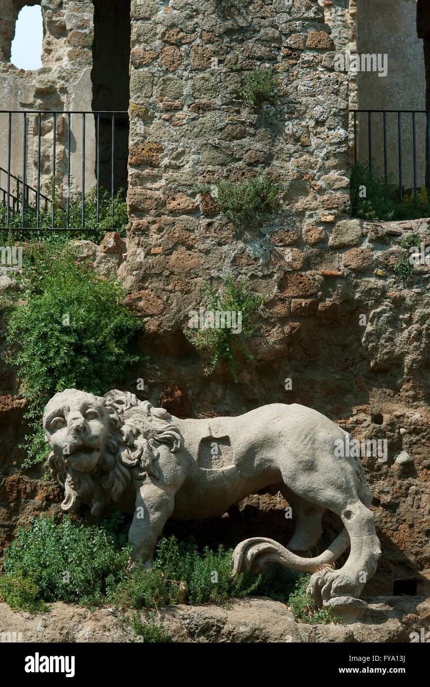 Lion statue by Gian Lorenzo Bernini, ruins of Orsini-Altieri Castle ...