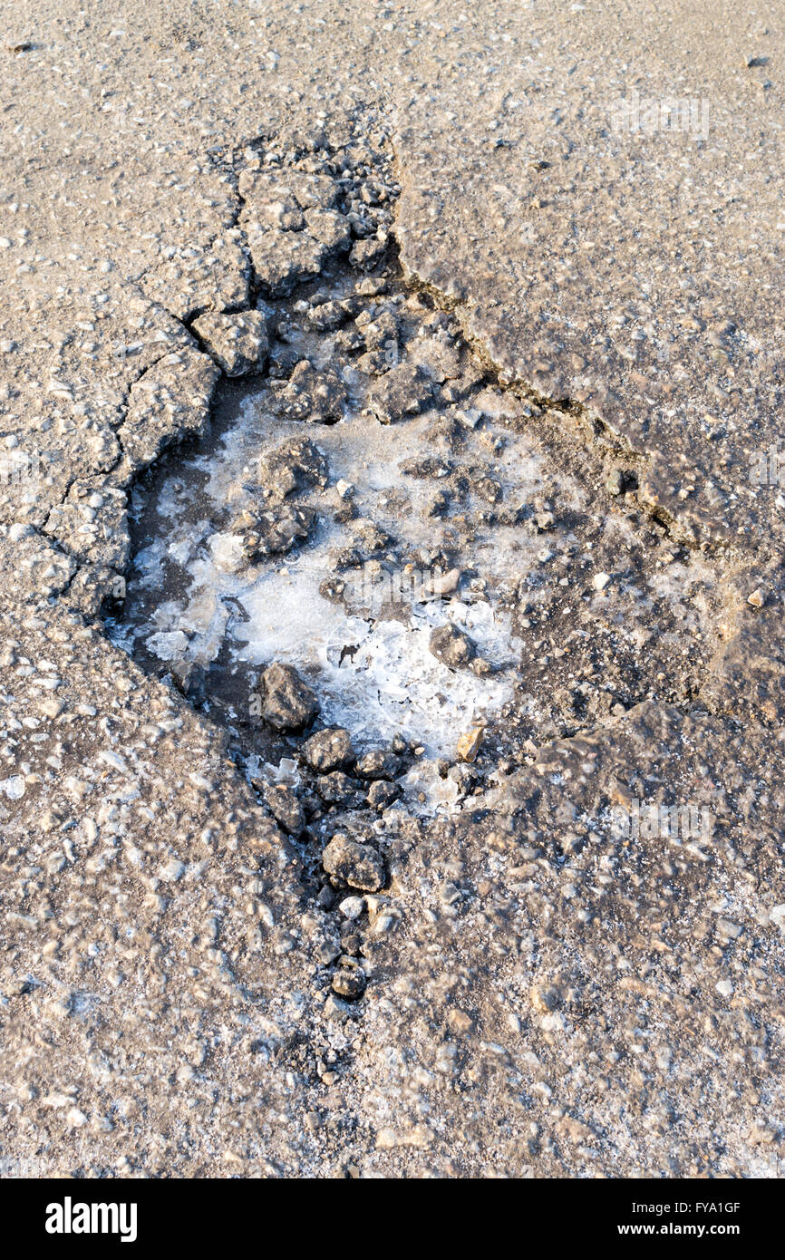 Pothole road hi-res stock photography and images - Alamy