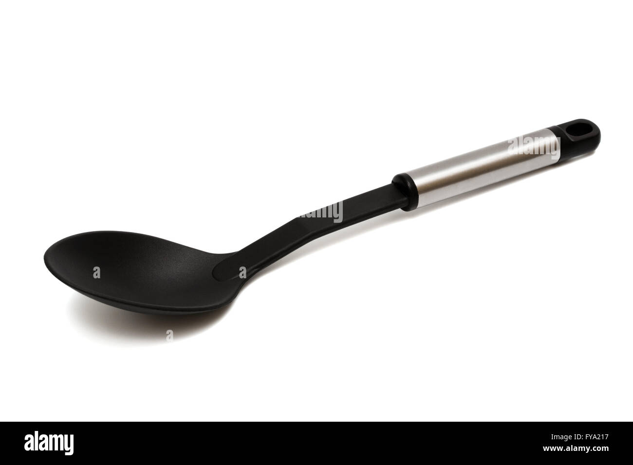 The plastic big spoon on a white background Stock Photo - Alamy