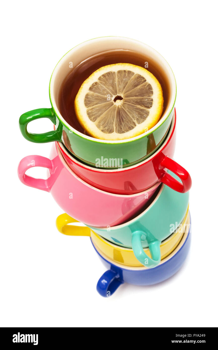 Beautiful color cups on a white background Stock Photo - Alamy