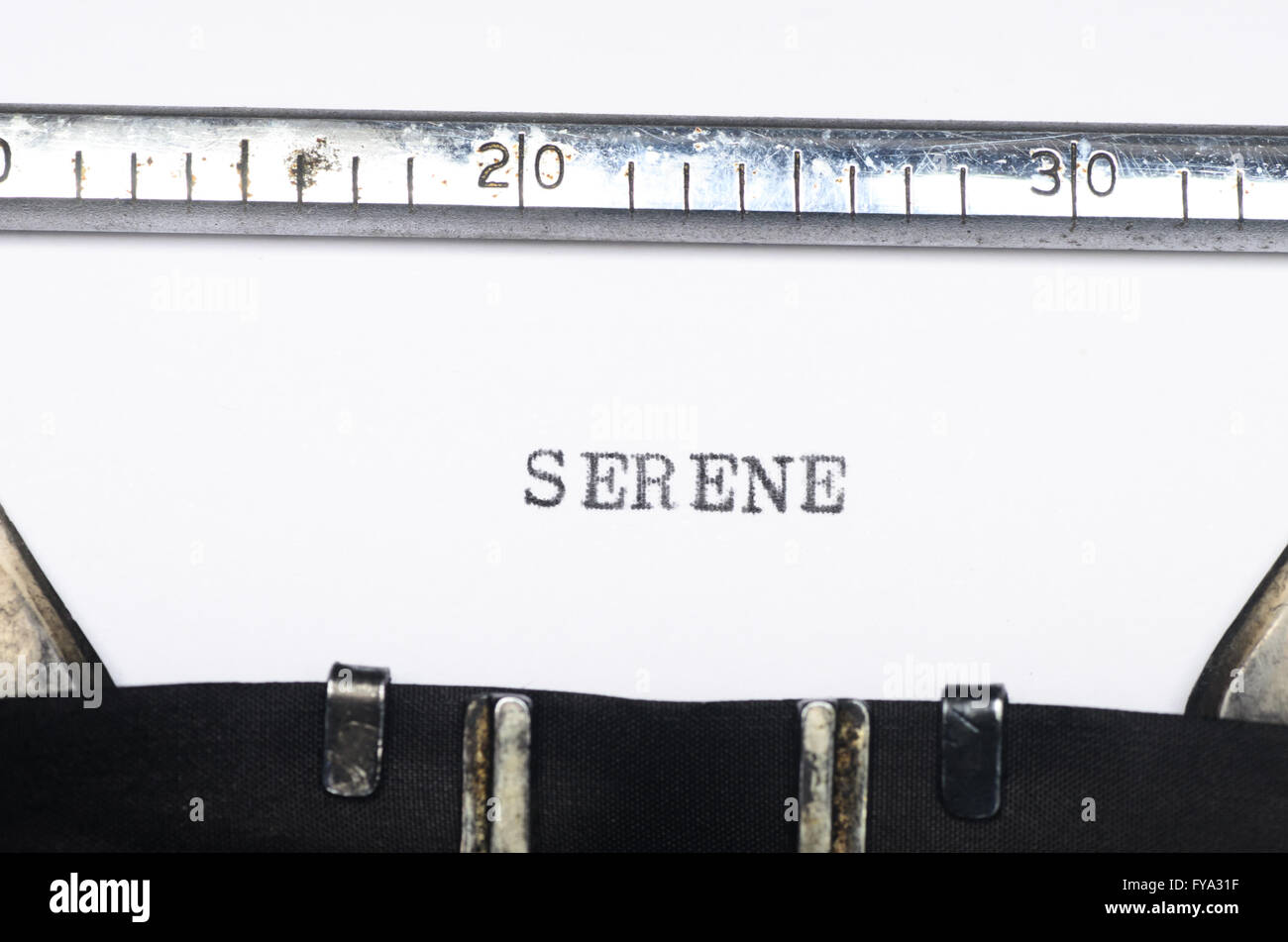 Word serene typed on an old typewriter Stock Photo - Alamy