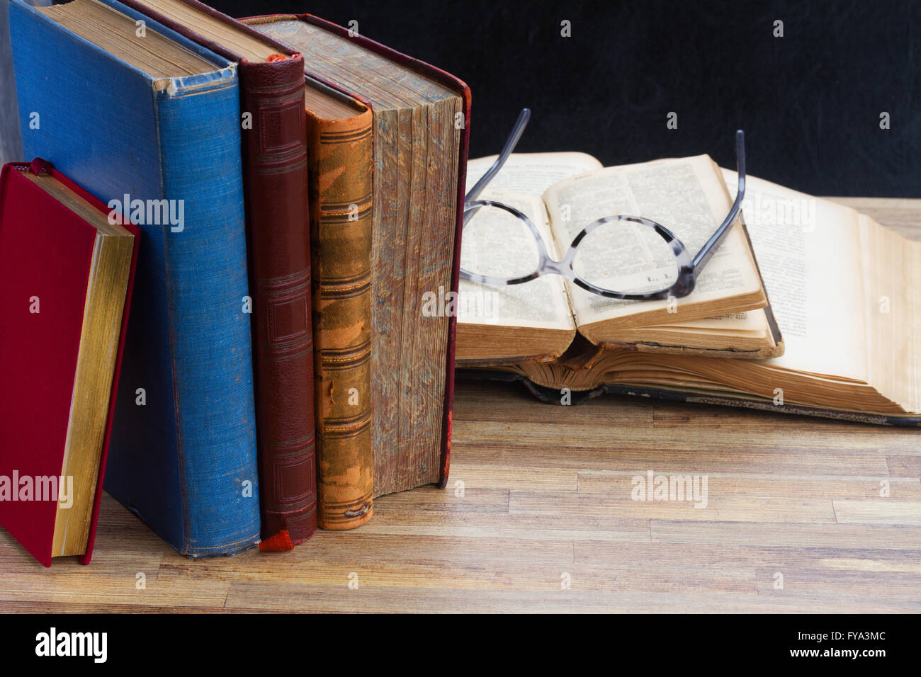 Books and glasses Stock Photo - Alamy