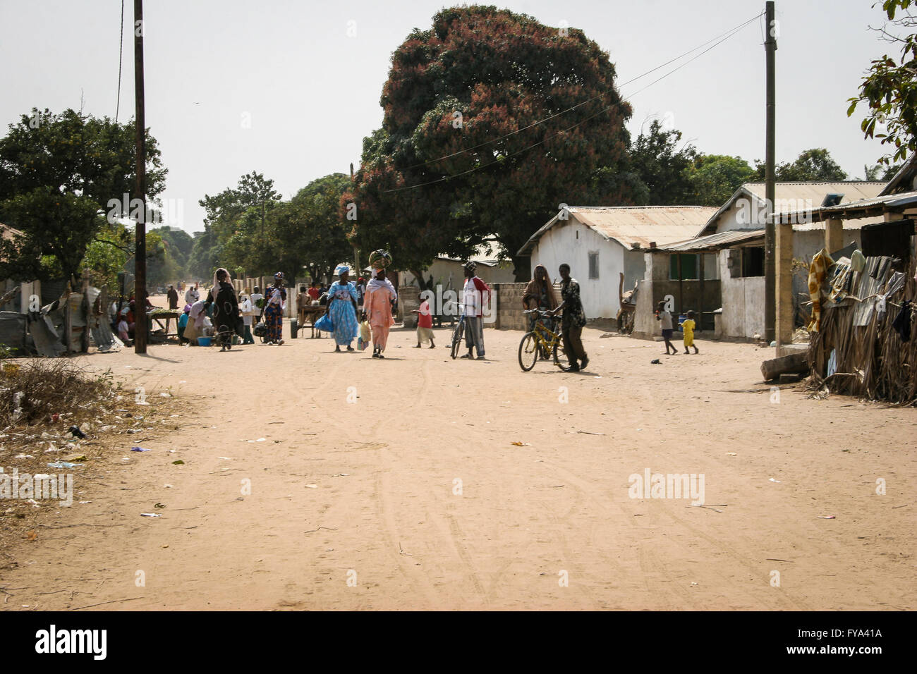 Tanji villages main road with people, Gambia, Africa Stock Photo - Alamy