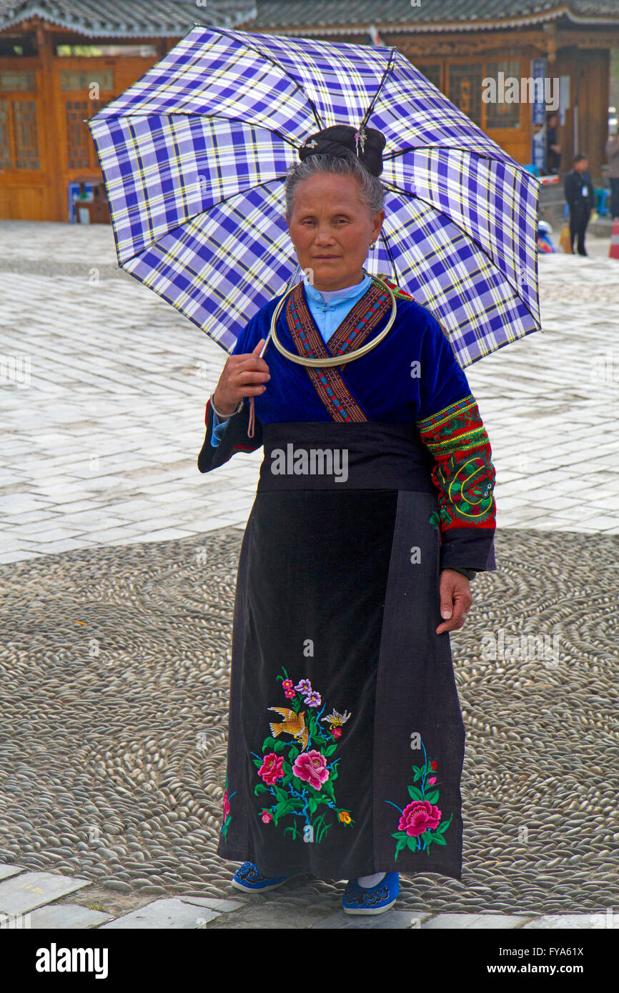 Traditionally dressed Dong woman in Xijiang village Stock Photo - Alamy