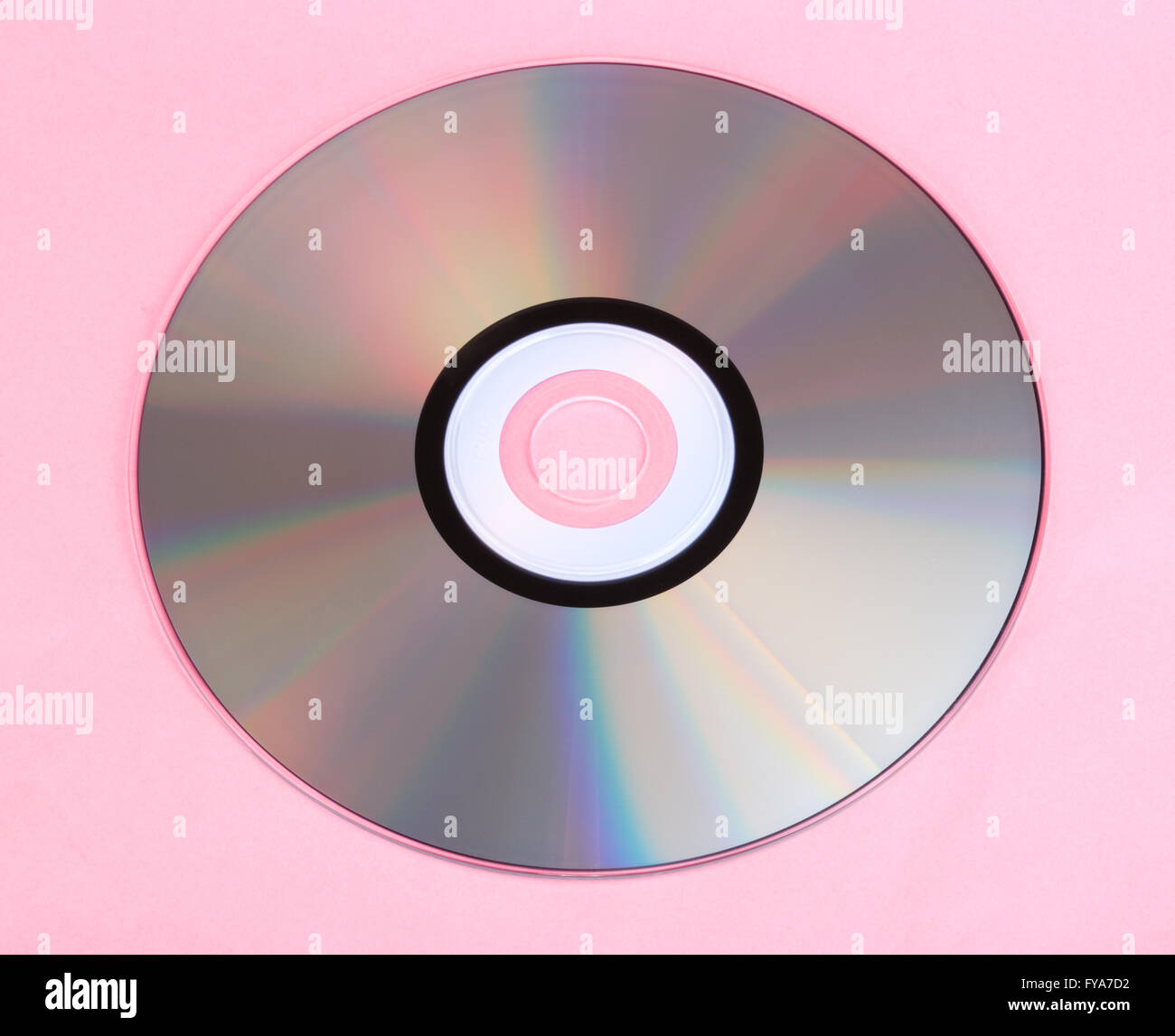 compact disc on pink background Stock Photo - Alamy