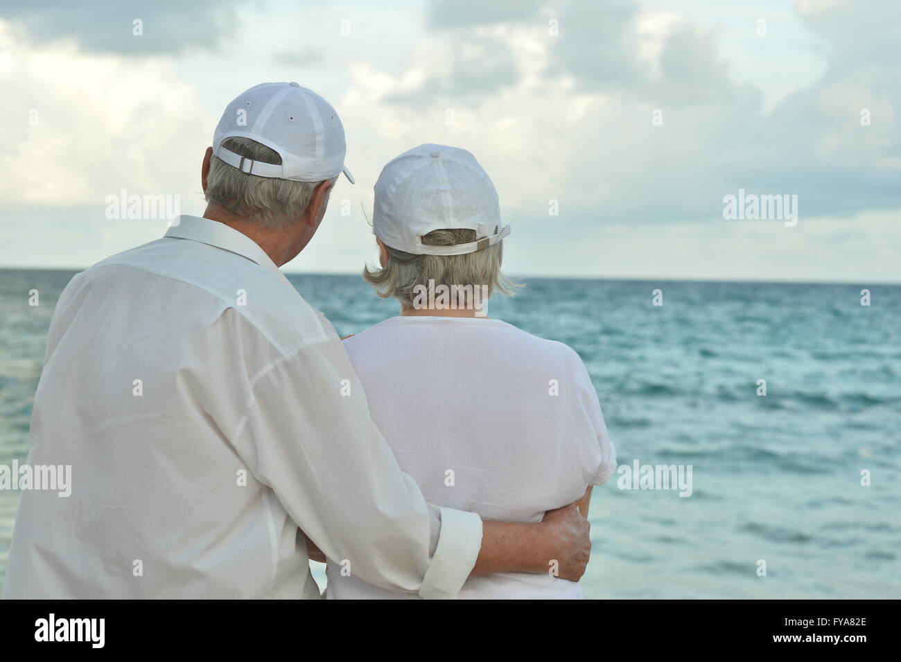 elderly couple rest at tropical beach Stock Photo - Alamy