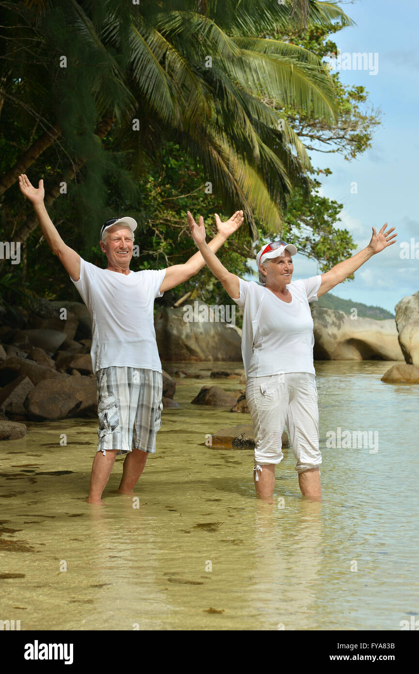 elderly couple rest at tropical beach Stock Photo - Alamy