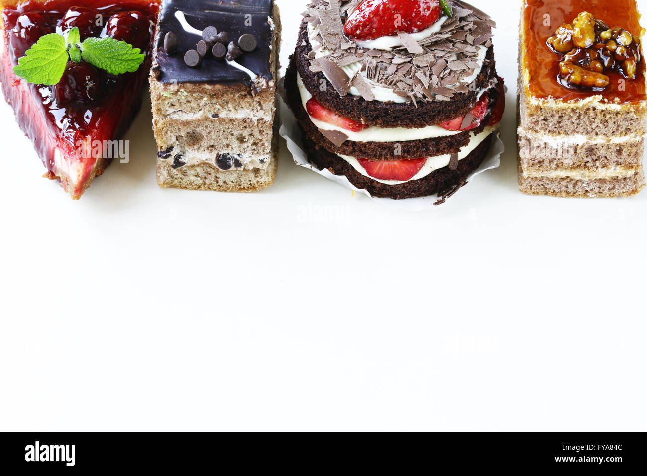 Assorted desserts, cakes and pastries on a white background Stock Photo ...