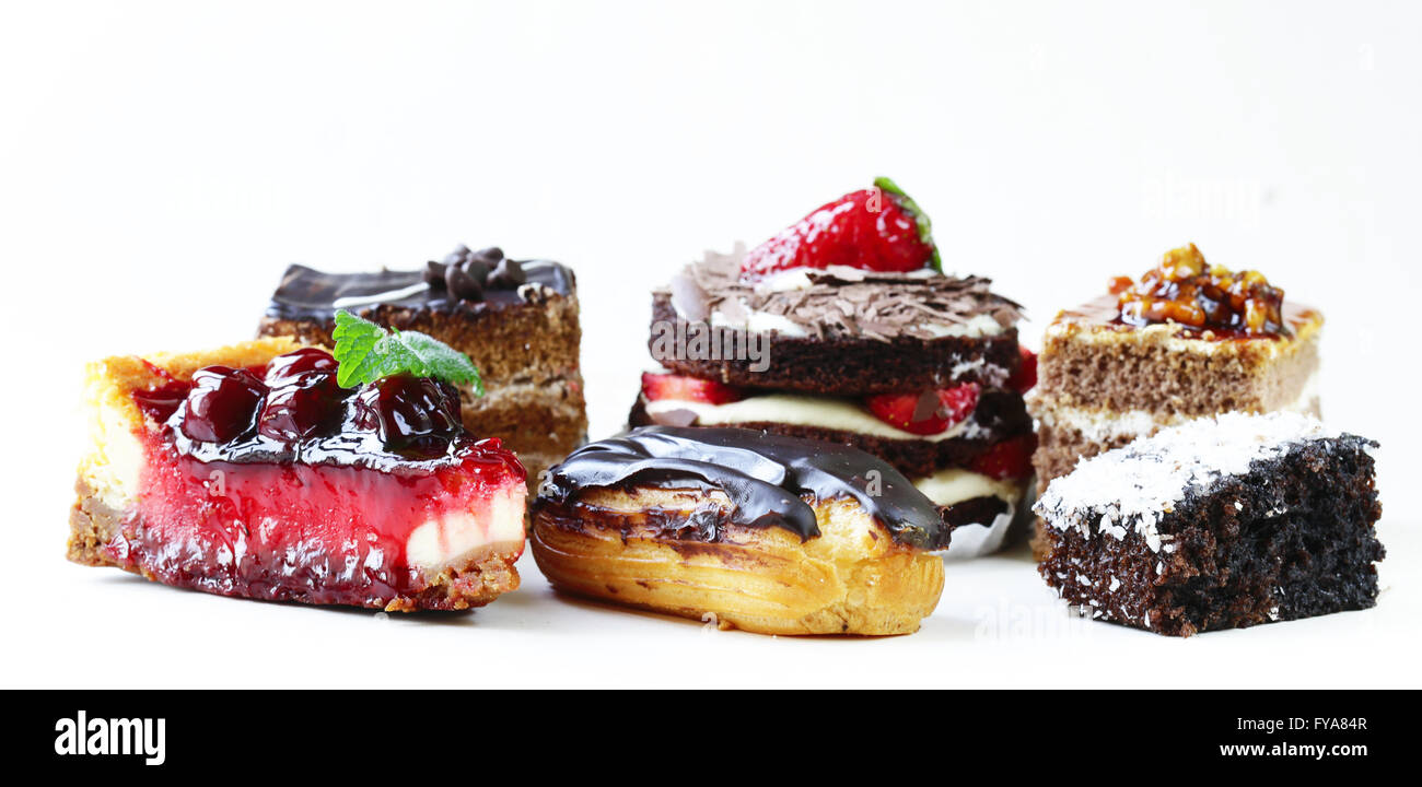 Assorted desserts, cakes and pastries on a white background Stock Photo ...