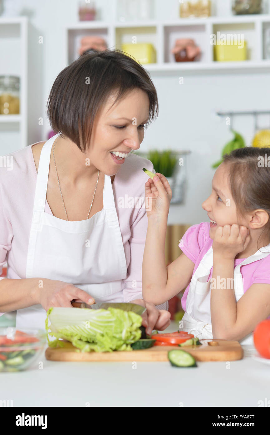 Mother and daughter cooking dinner Stock Photo - Alamy