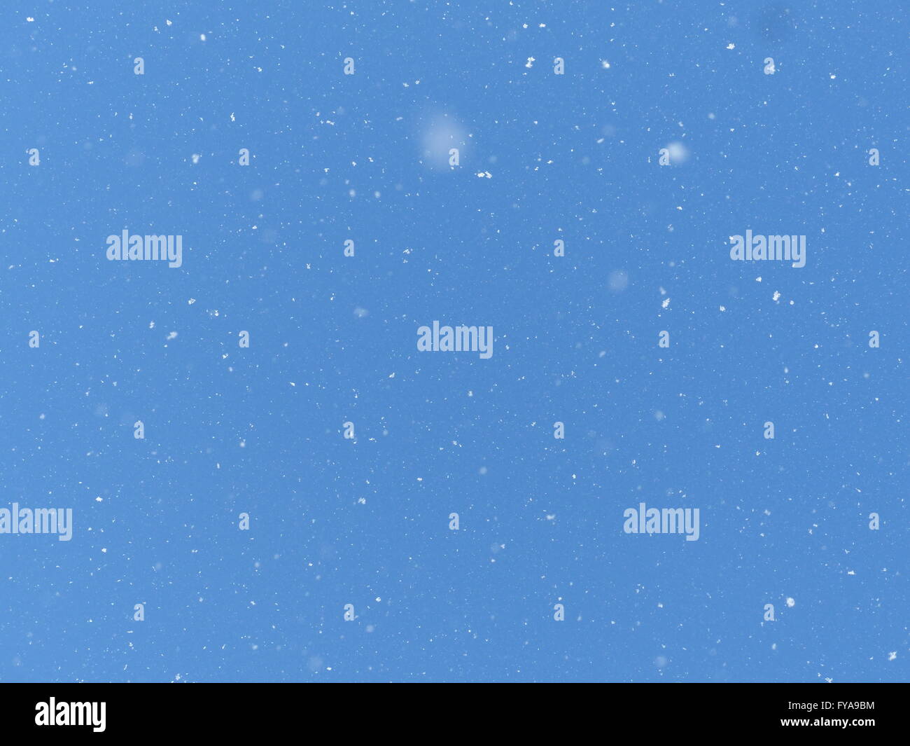 snow out of blue sky Stock Photo - Alamy
