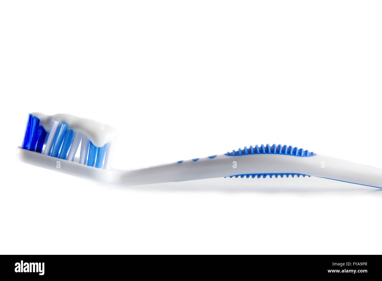 toothbrush with toothpaste in isolated white background Stock Photo - Alamy