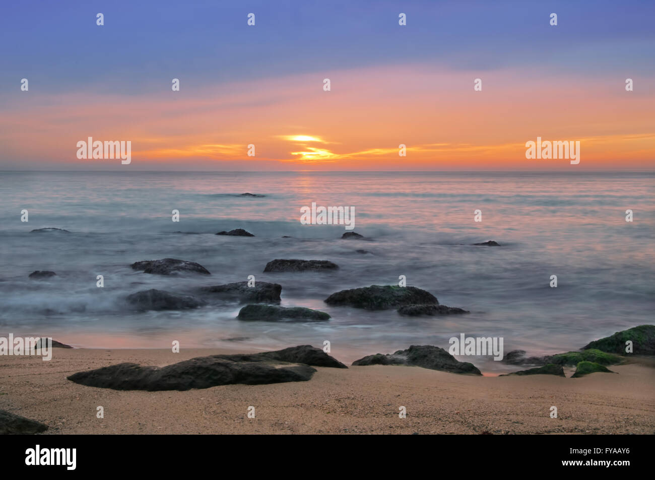Beautiful sunset over sea water hi-res stock photography and images - Alamy