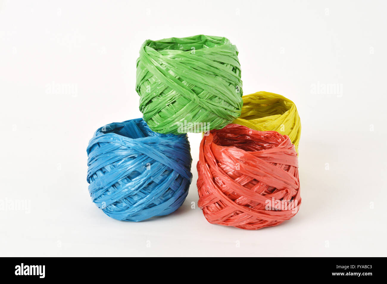 stack of colorful plastic rope on the white background Stock Photo - Alamy