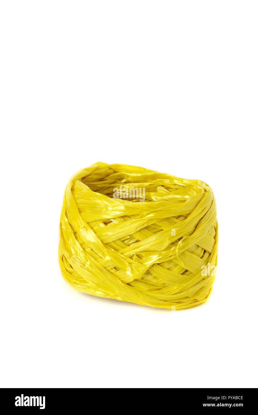 yellow plastic rope on the white background Stock Photo - Alamy