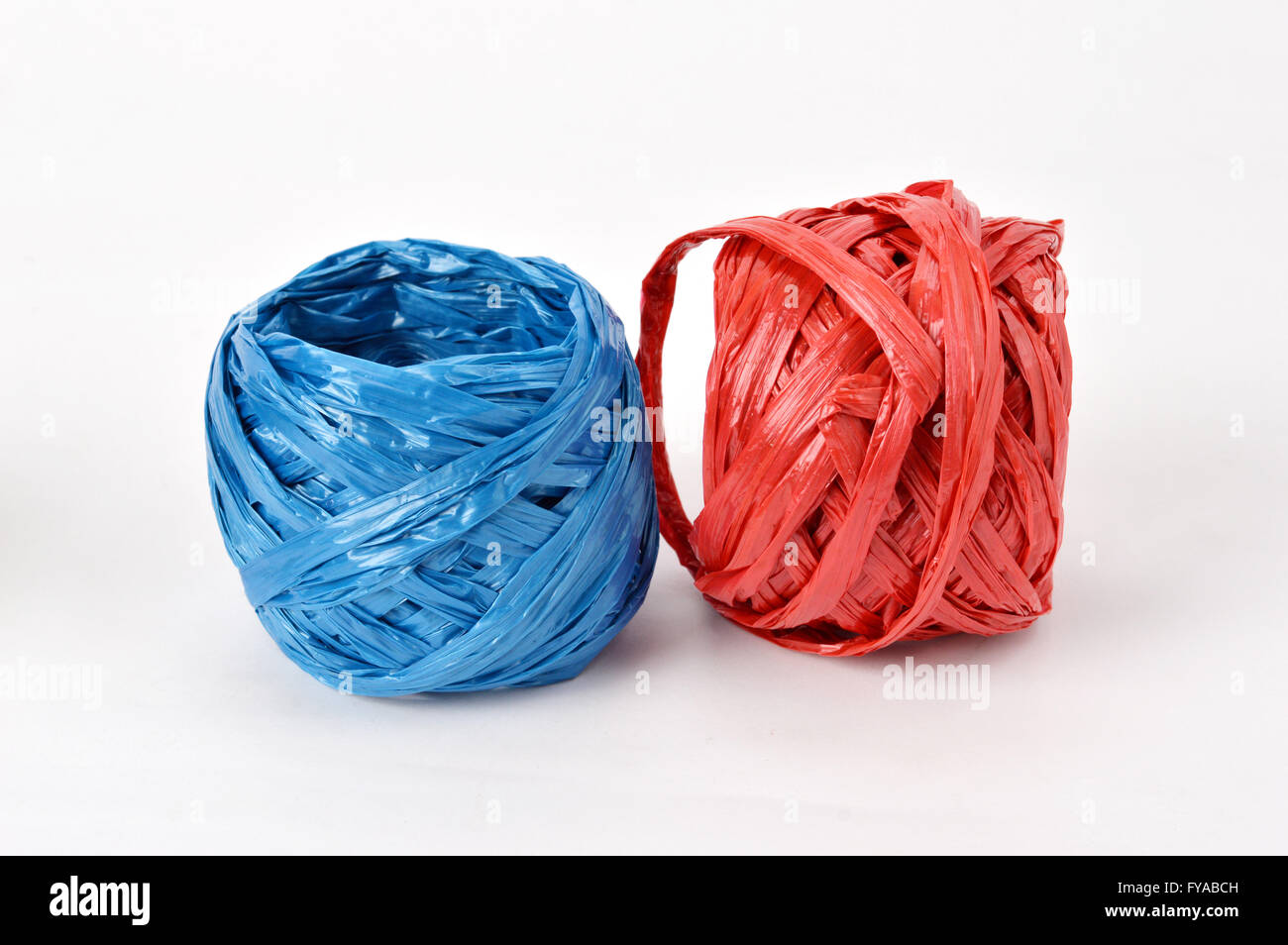 red and blue plastic rope on the white background Stock Photo - Alamy