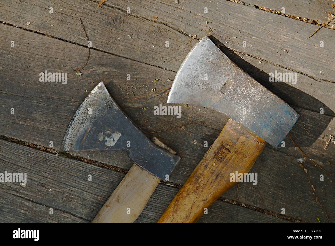 Two Axes on the ground Stock Photo - Alamy