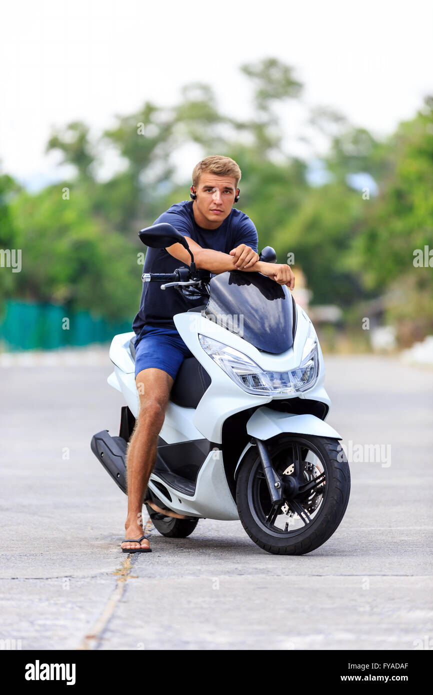 Man posing on motorcycle hi-res stock photography and images - Alamy