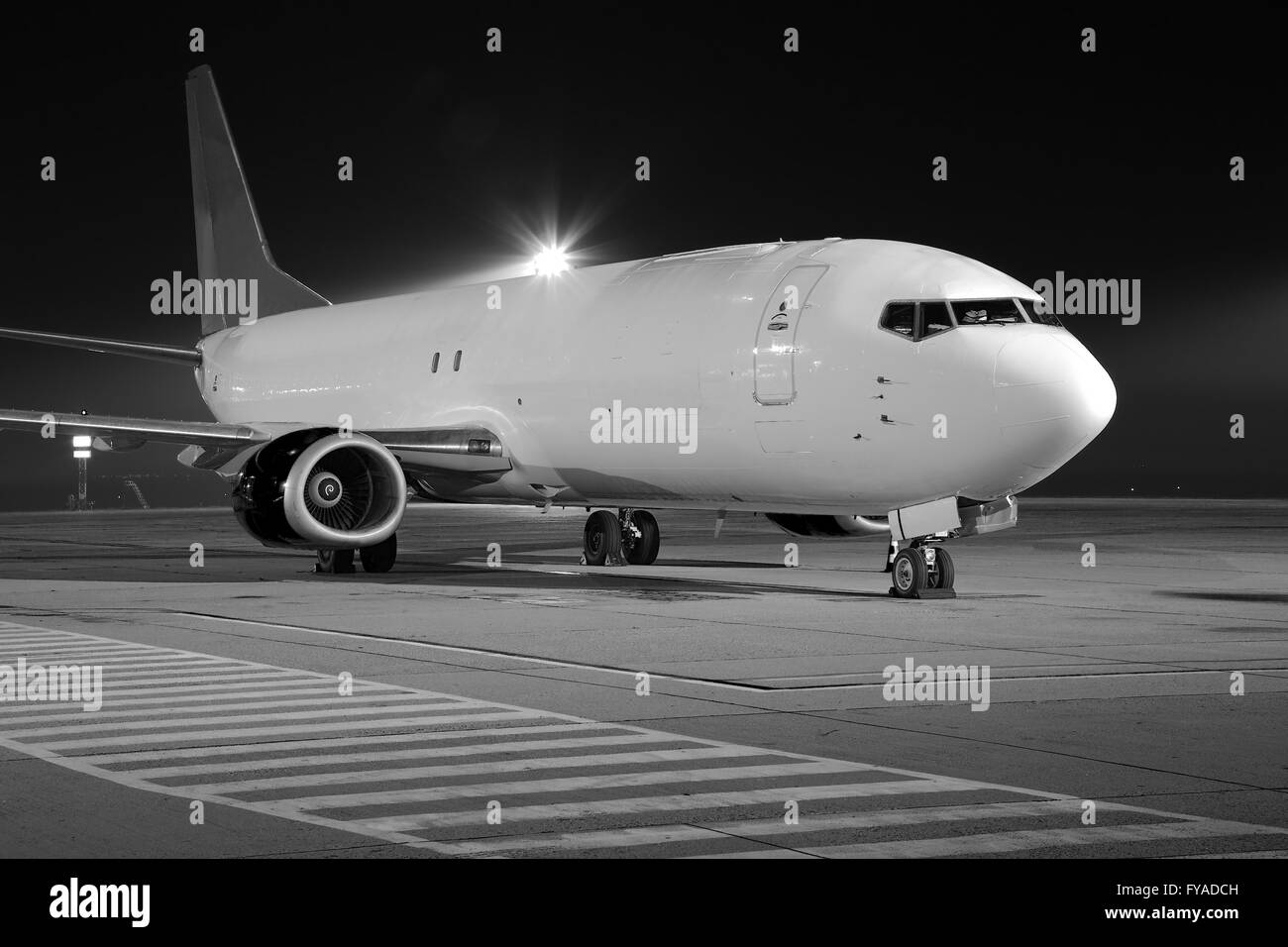 Plane at night Stock Photo - Alamy