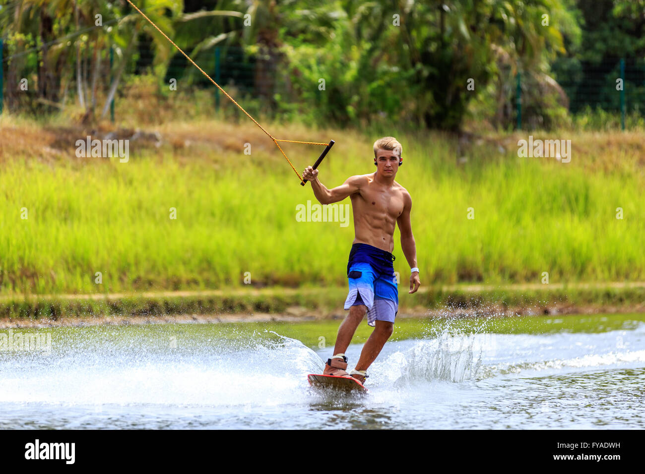 Man Wakeboarding in action. Phuket, Thailand Stock Photo - Alamy