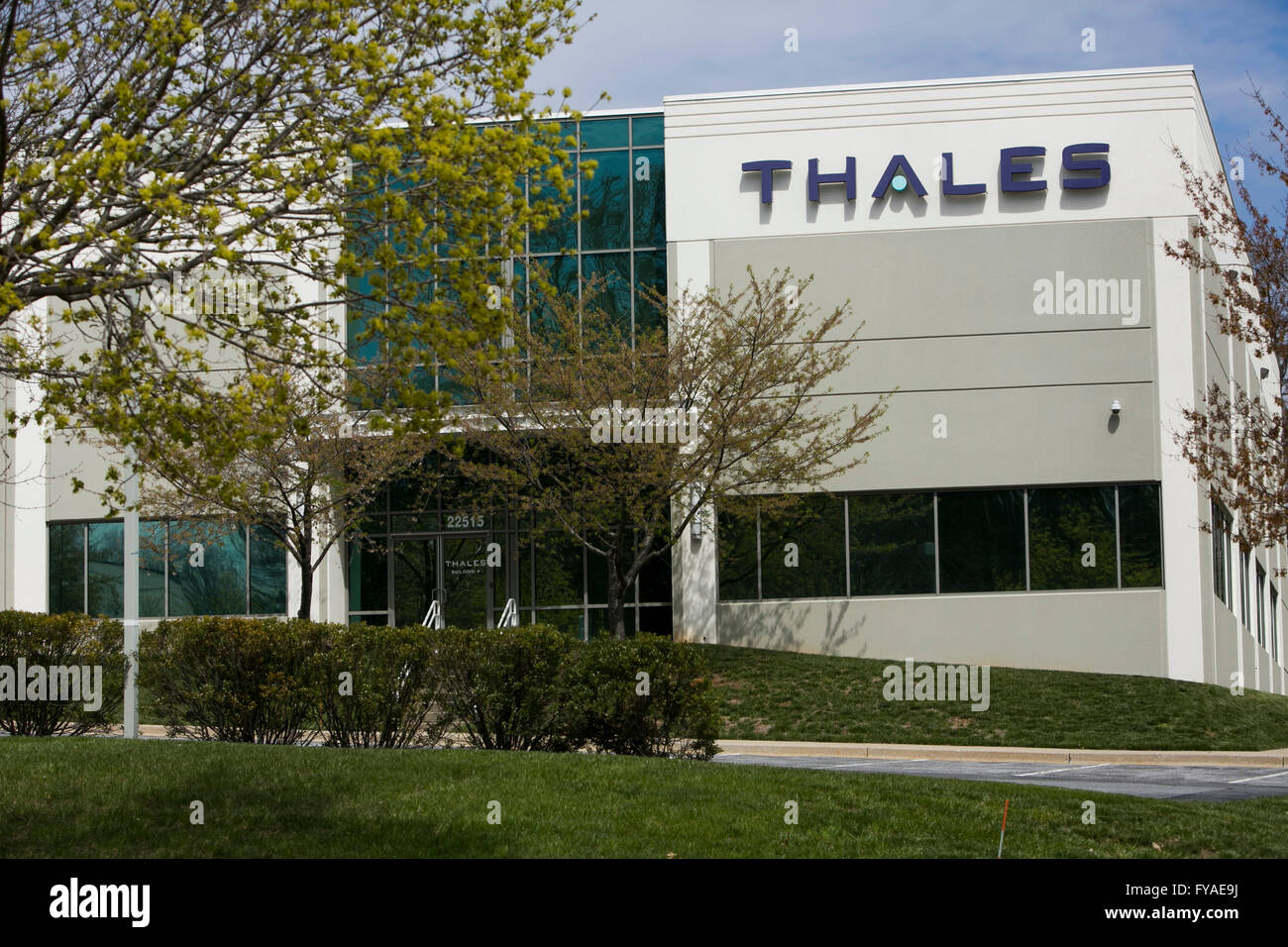 A logo sign outside of a facility occupied by the Thales Group in ...