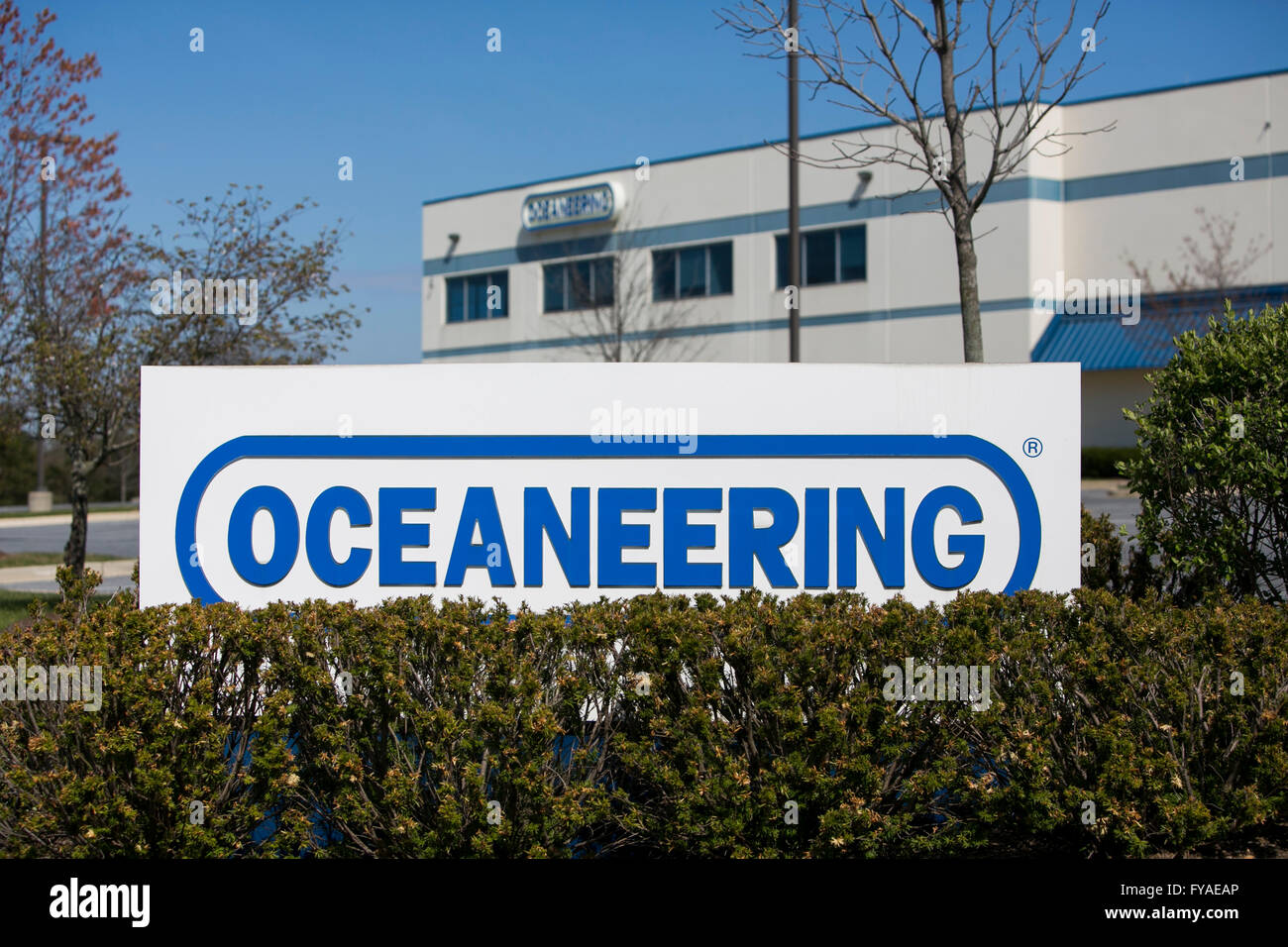 A logo sign outside of a facility occupied by Oceaneering International ...