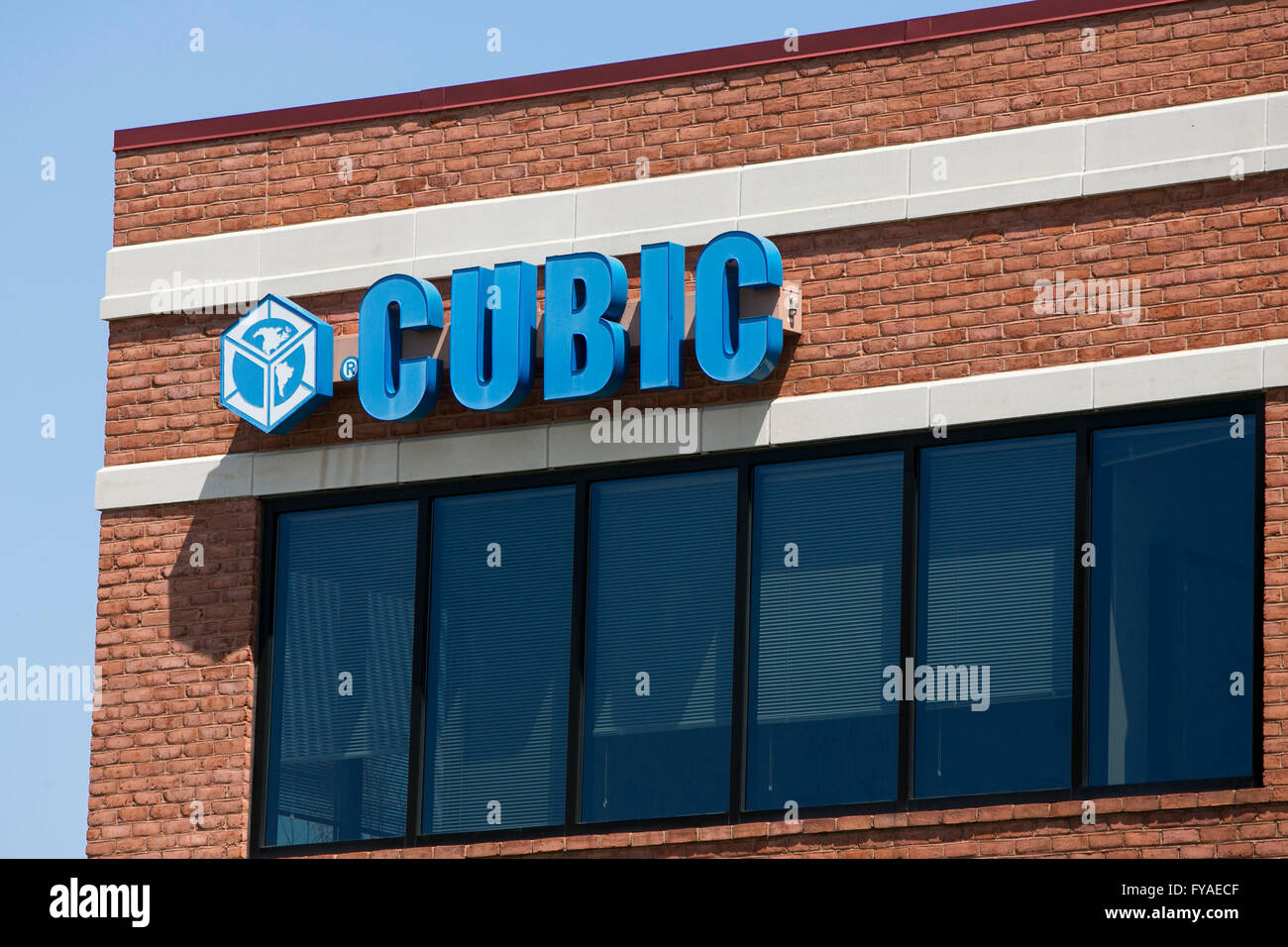 A logo sign outside of a facility occupied by the Cubic Corporation on ...
