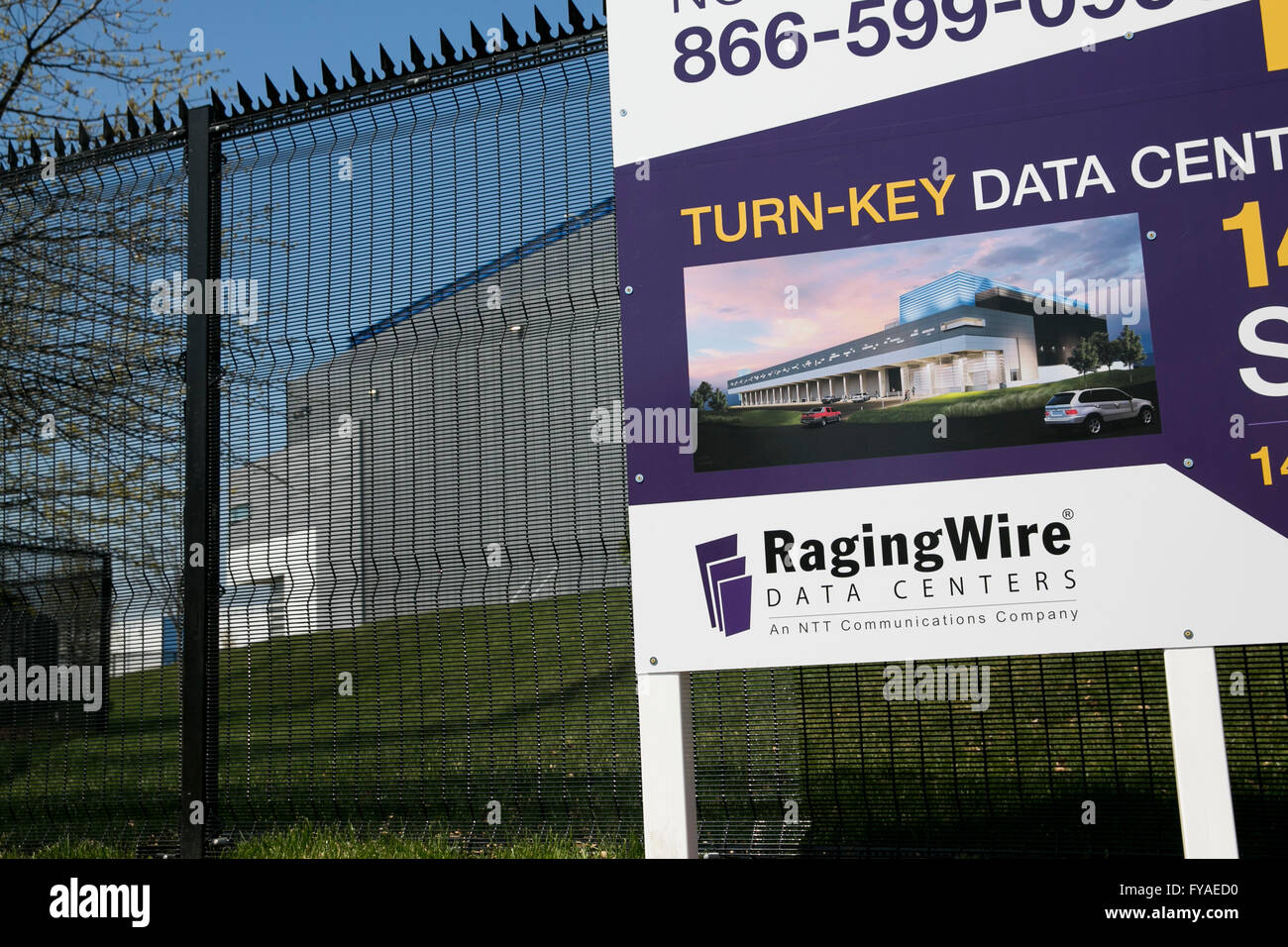 A logo sign outside of a data center operated by RagingWire in Ashburn ...