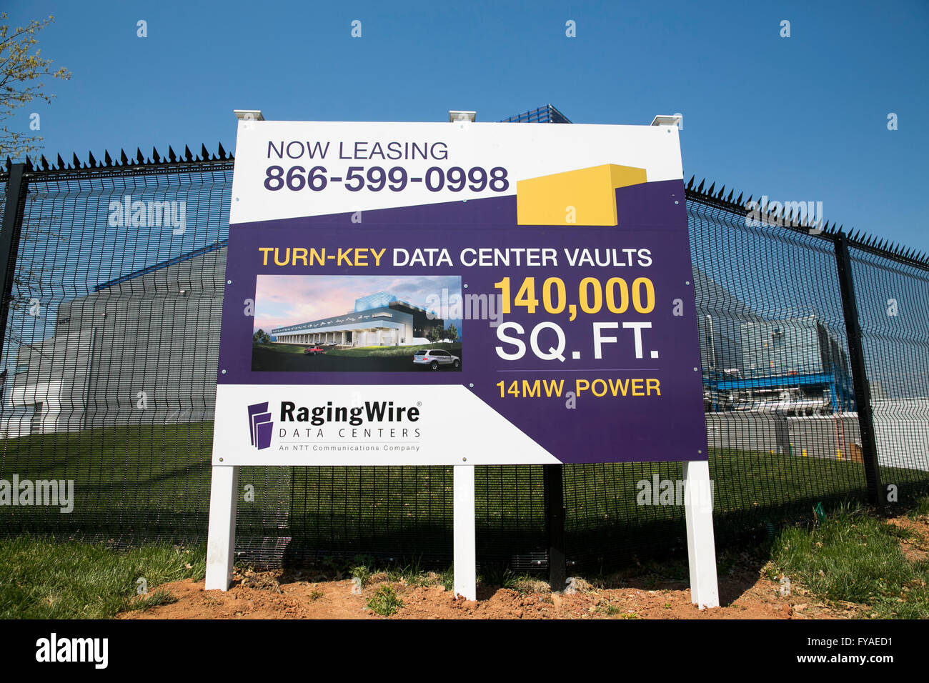 A logo sign outside of a data center operated by RagingWire in Ashburn ...