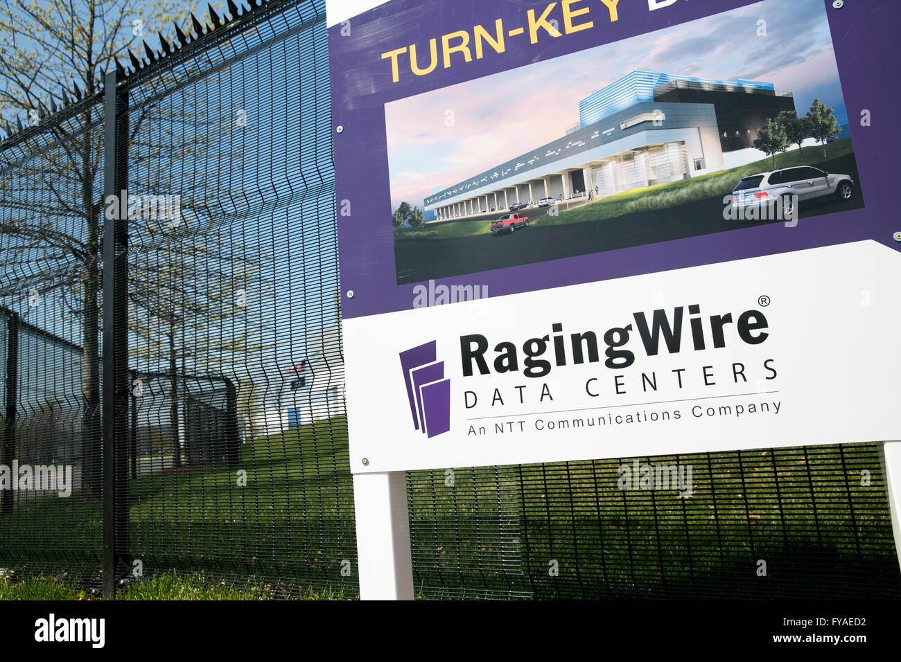 A logo sign outside of a data center operated by RagingWire in Ashburn ...