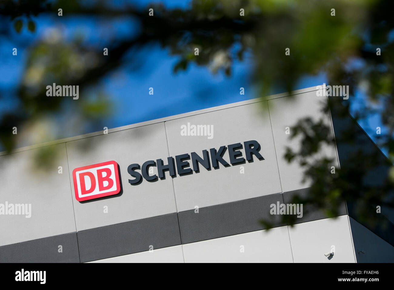 A logo sign outside of a facility occupied by DB Schenker in Carlisle ...