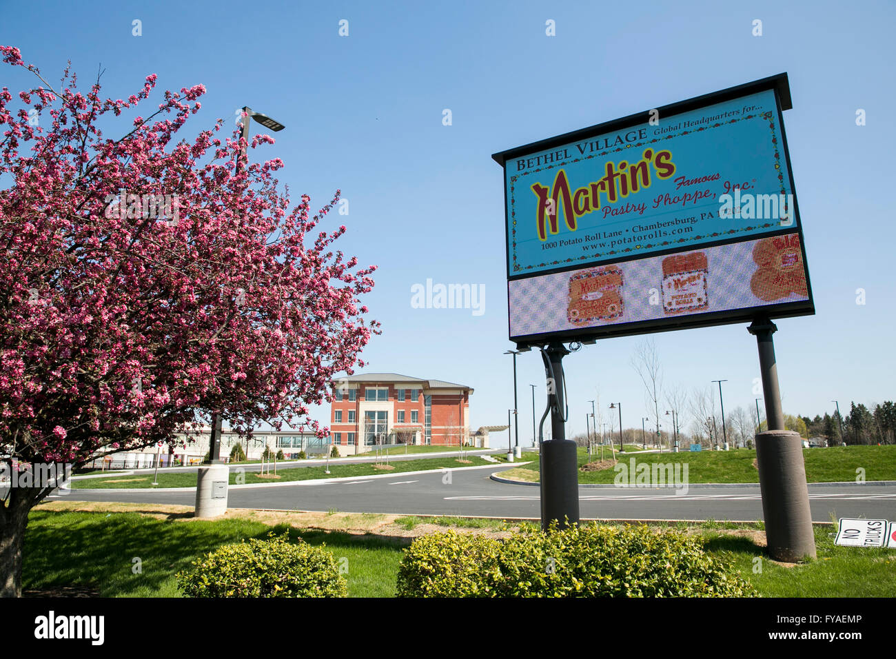 A logo sign outside of the headquarters of Martin's Famous Pastry ...