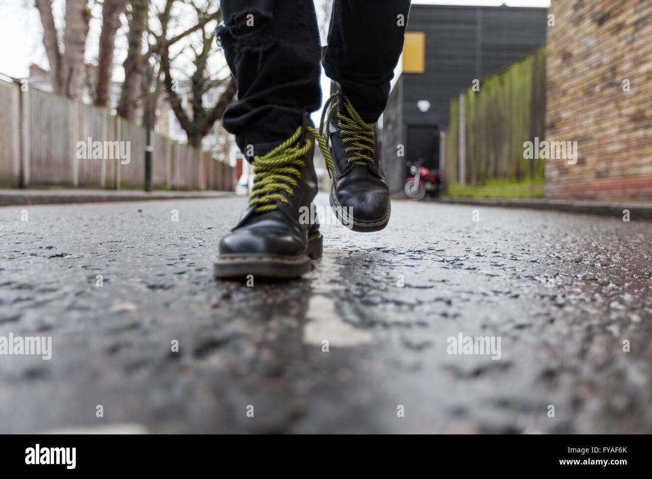 People walking down a street hi-res stock photography and images - Alamy