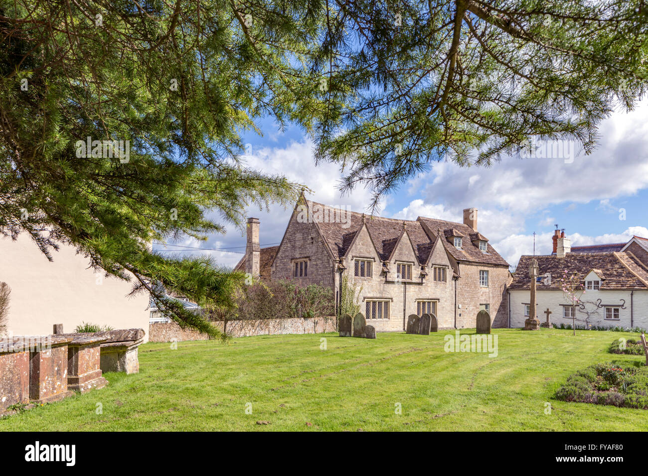 Historic buildings surround the churchyard of St Sampson's Church in ...