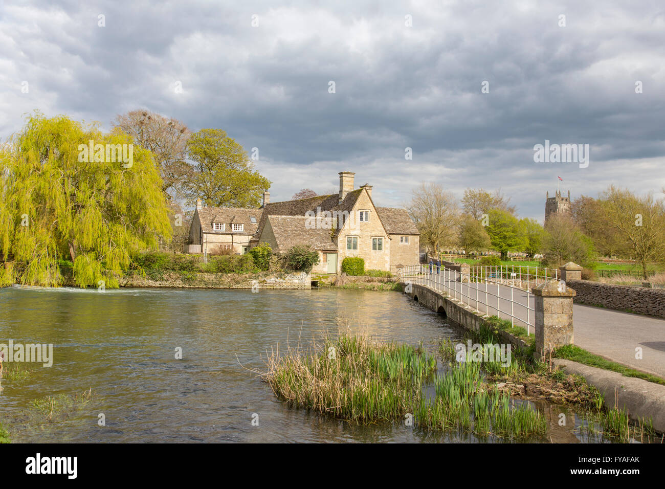 Fairford Mill and the River Coln in the small Cotswold town of Fairford ...