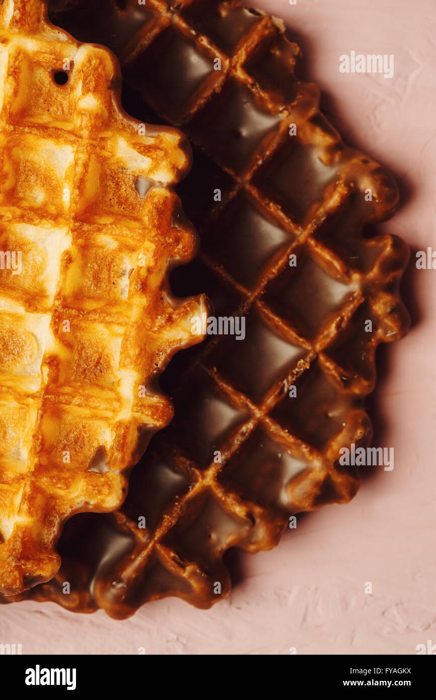 Round Belgian Waffles with Chocolate Icing Extreme Close-up on Pink ...