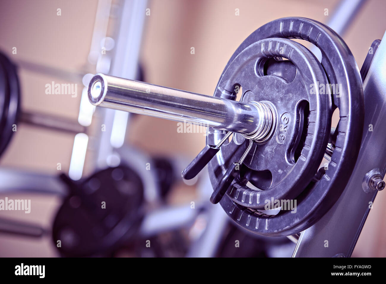 diverse equipment and machines at the gym room Stock Photo - Alamy