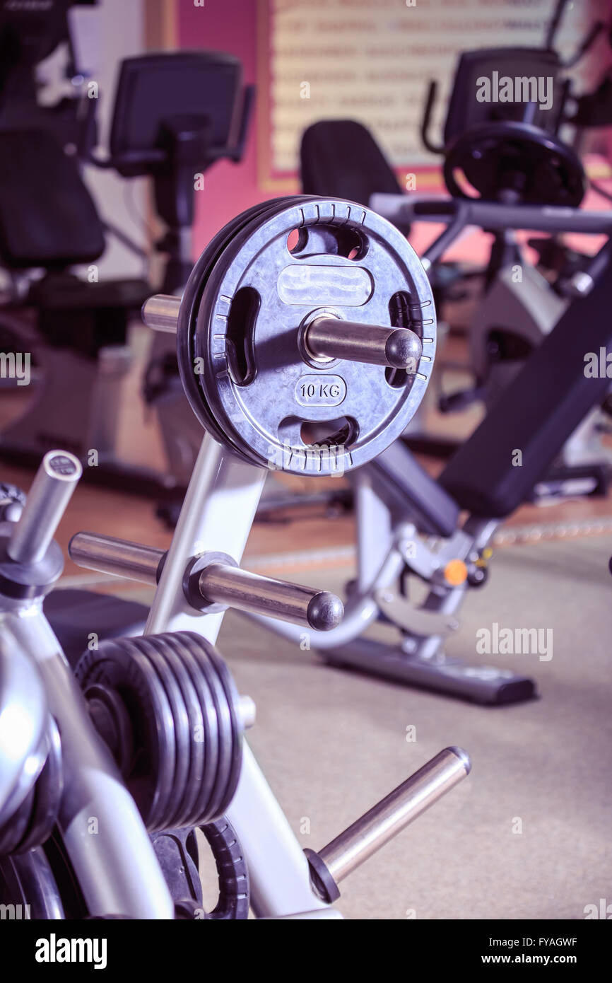 diverse equipment and machines at the gym room Stock Photo - Alamy