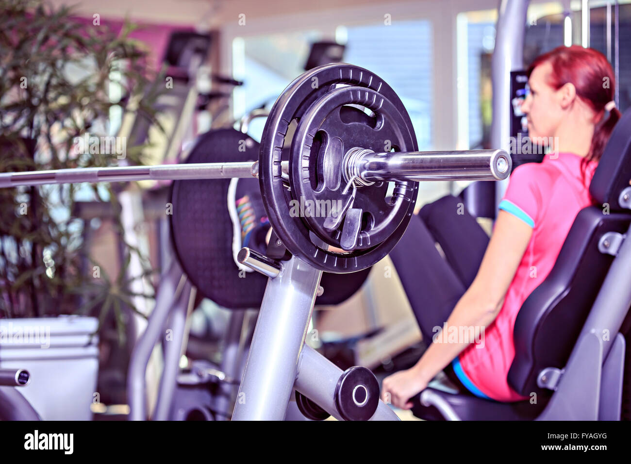 diverse equipment and machines at the gym room Stock Photo - Alamy