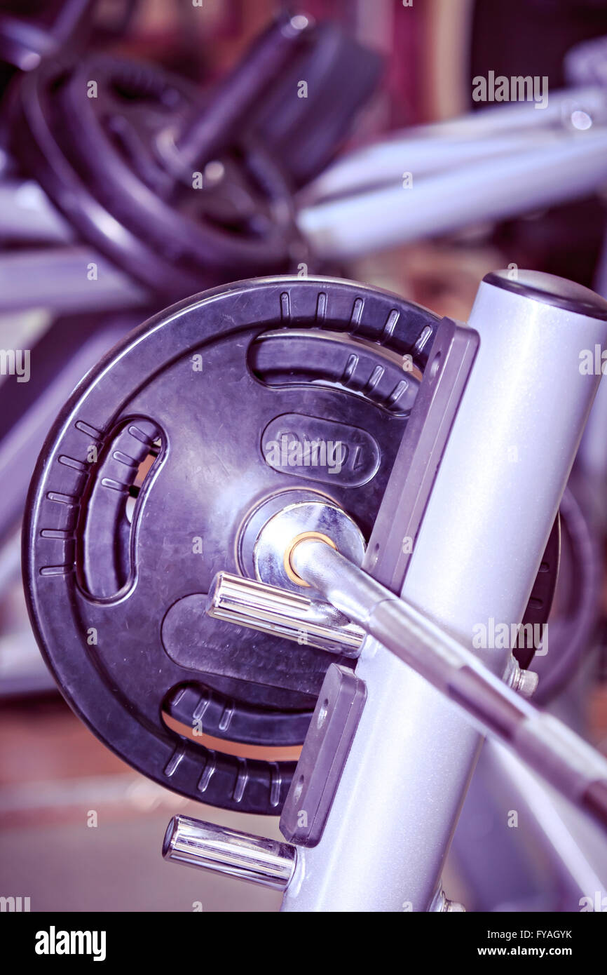diverse equipment and machines at the gym room Stock Photo - Alamy
