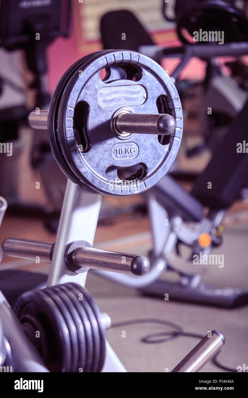 diverse equipment and machines at the gym room Stock Photo - Alamy