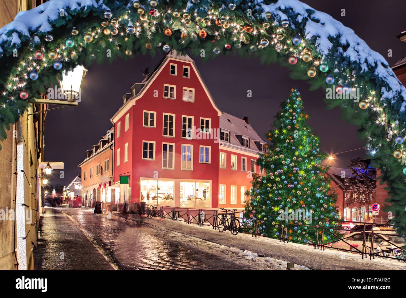 Christmas market by night in a German town Stock Photo - Alamy