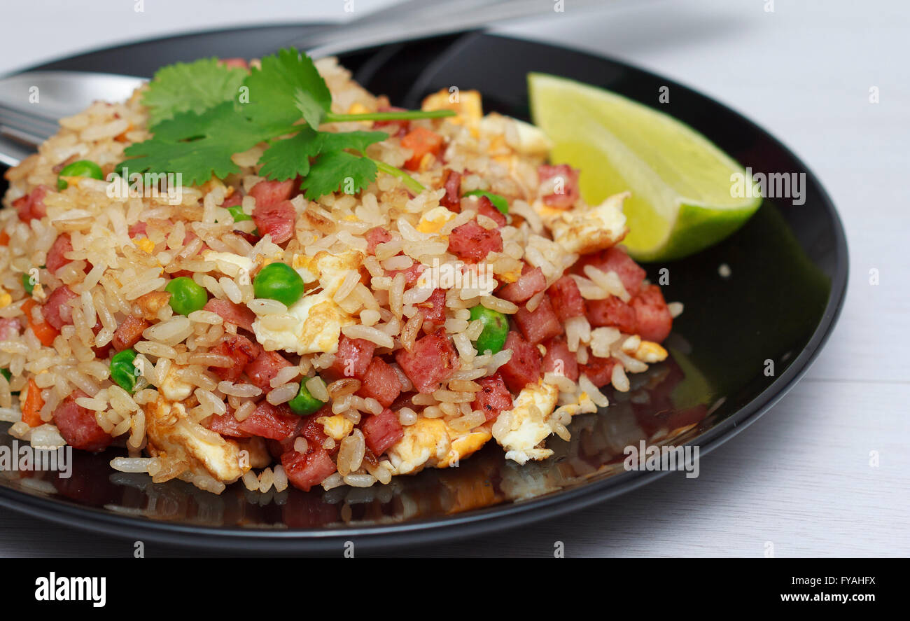 Dice Bacon Fried rice in black dish Stock Photo - Alamy