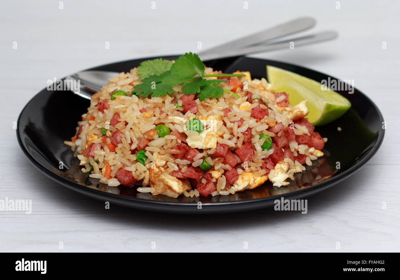 Dice Bacon Fried rice in black dish Stock Photo - Alamy