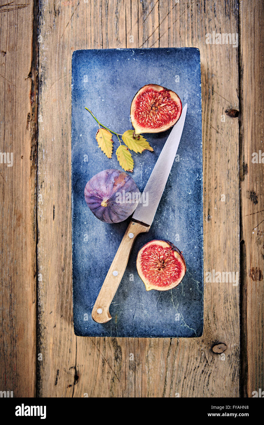 still life with figs plate and a knife Stock Photo - Alamy