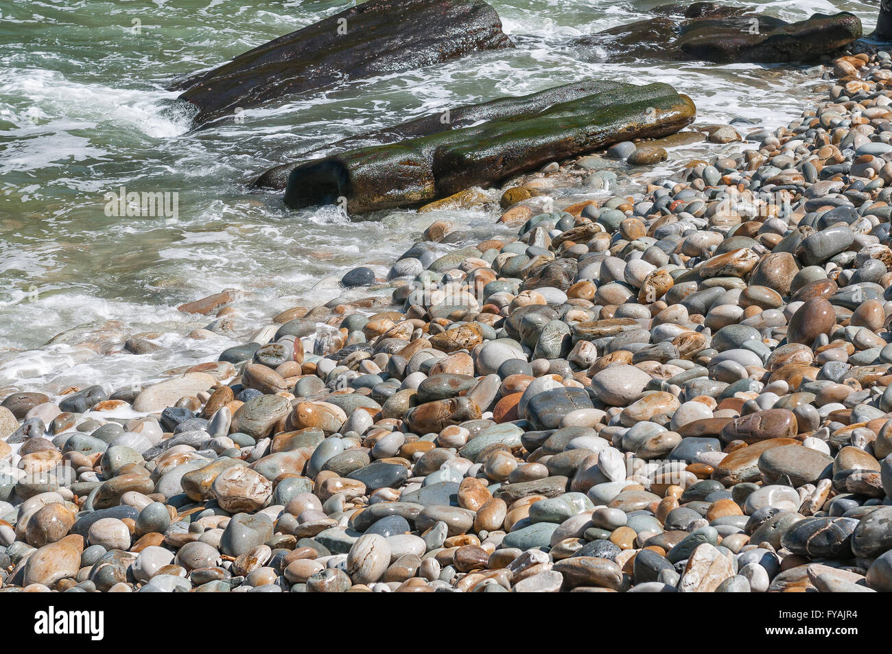 A pebble beach on the Eastern Cape coast of South Africa Stock Photo ...